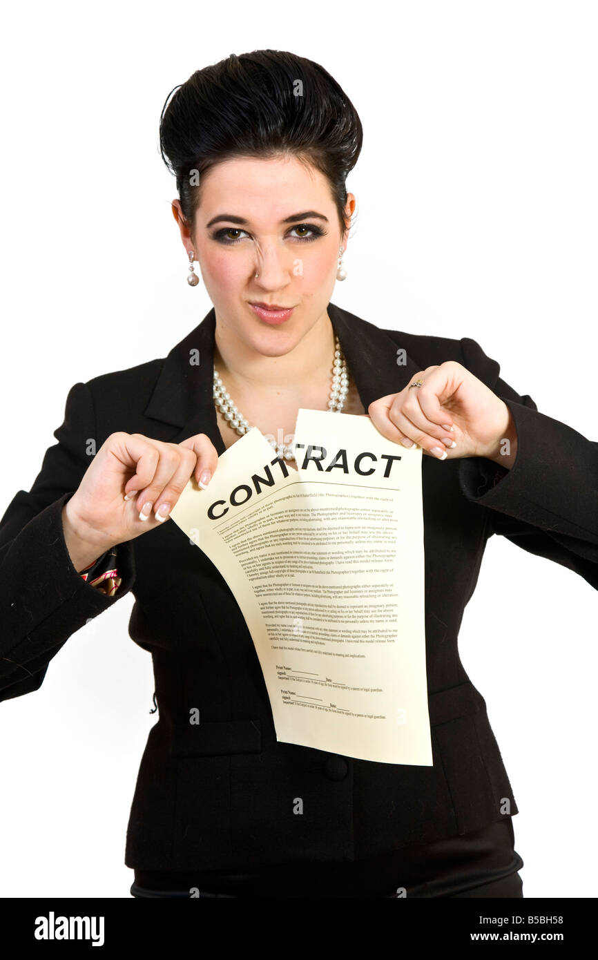 Woman tearing up contract hi-res stock photography and images - Alamy