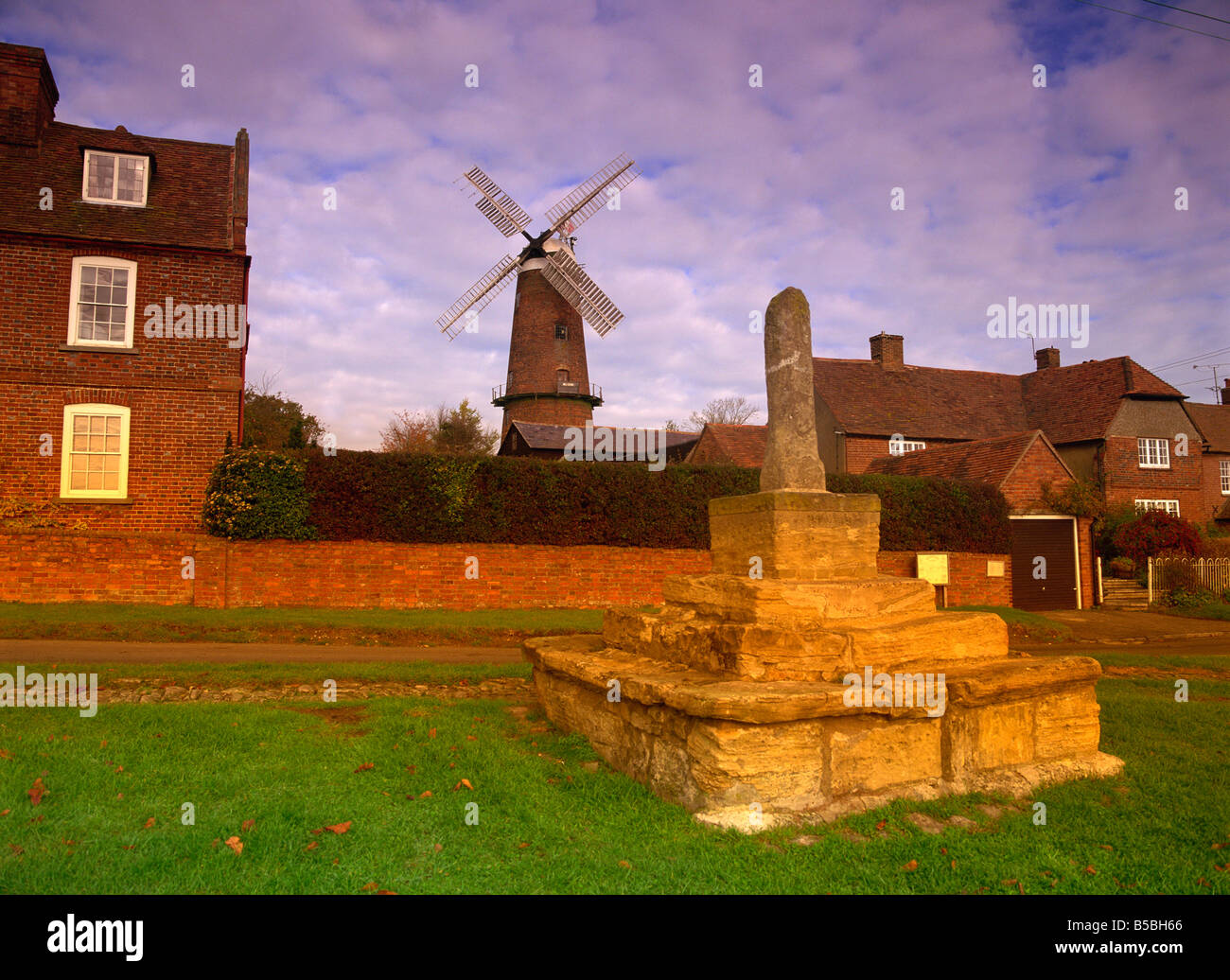 Village green cross and windmill Quainton Buckinghamshire England ...