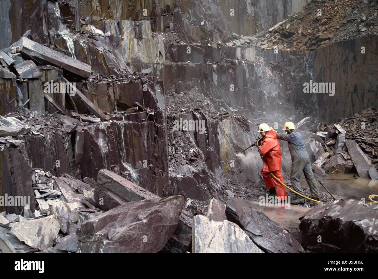 Pneumatic drilling of blast hole Nantlle Slate Quarry Snowdonia north ...