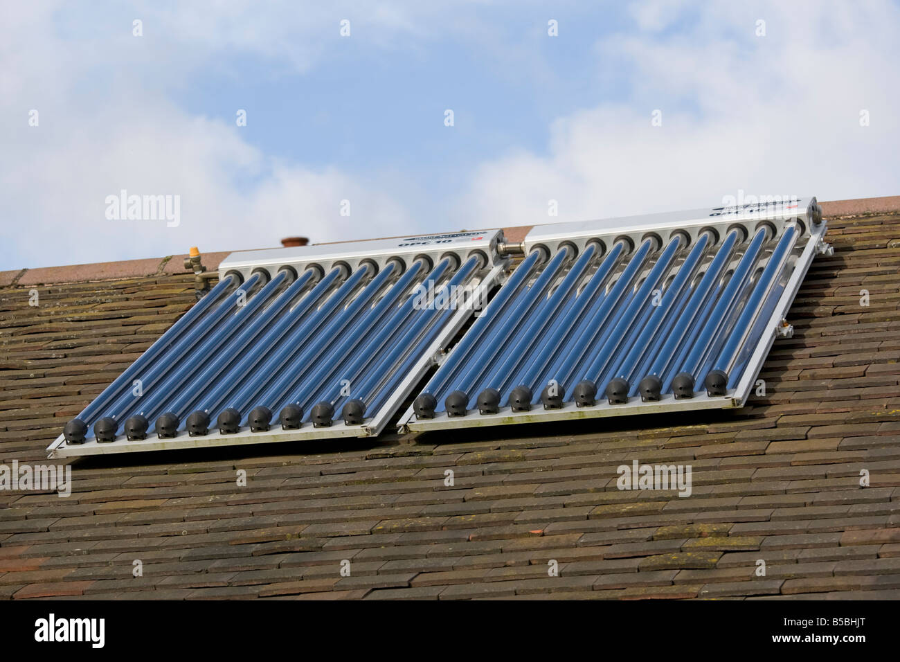 Solar thermal panels with evacuated tubes on roof of Worcestershire ...