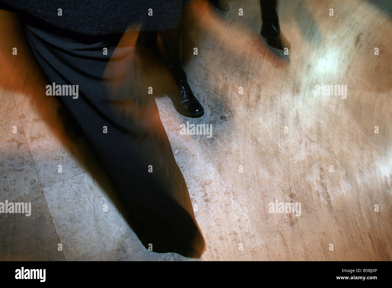 one person walking in street in city town Stock Photo - Alamy