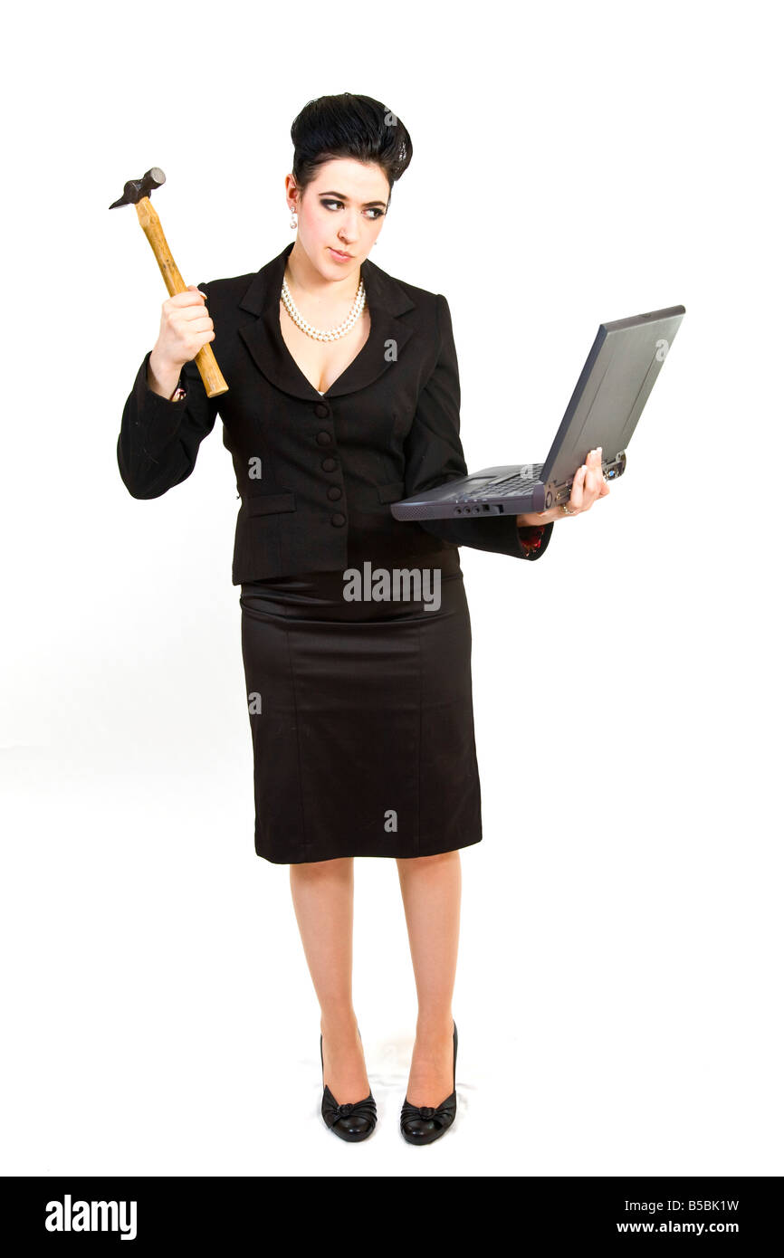 Woman hitting laptop computer hammer hi-res stock photography and ...