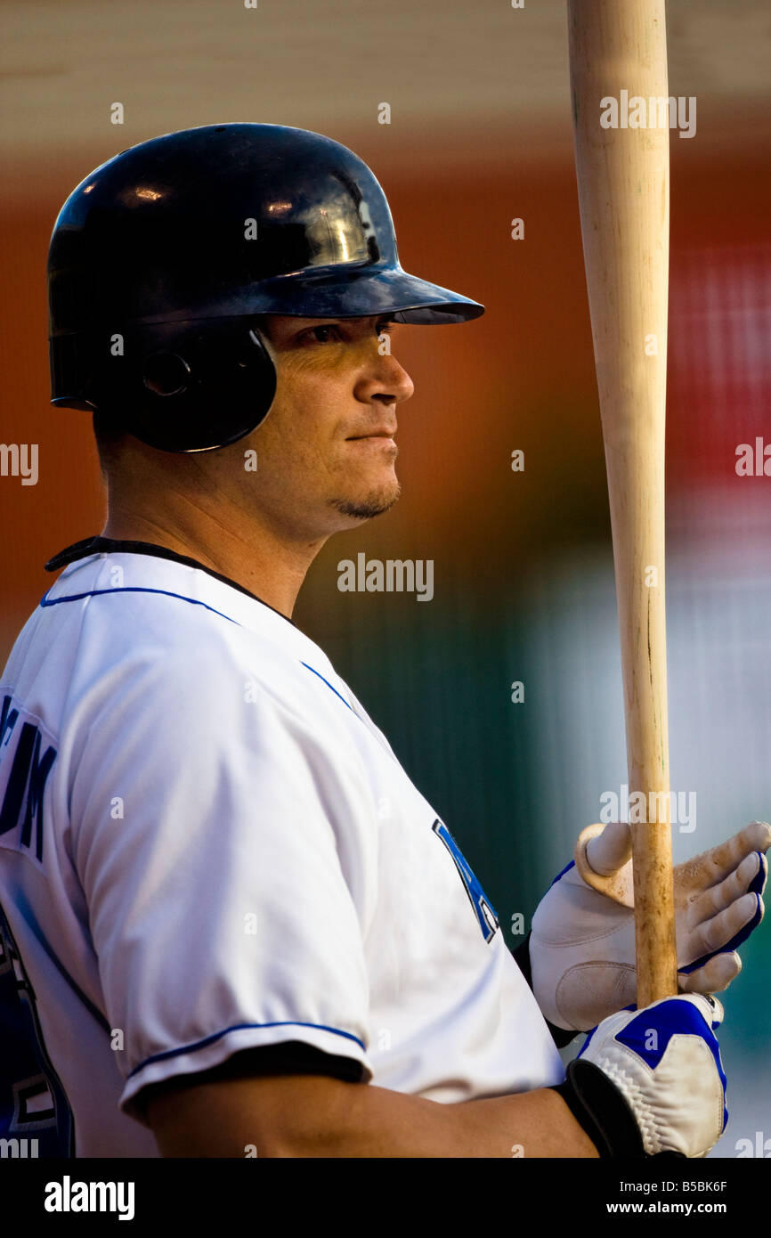 Man playing baseball Stock Photo - Alamy