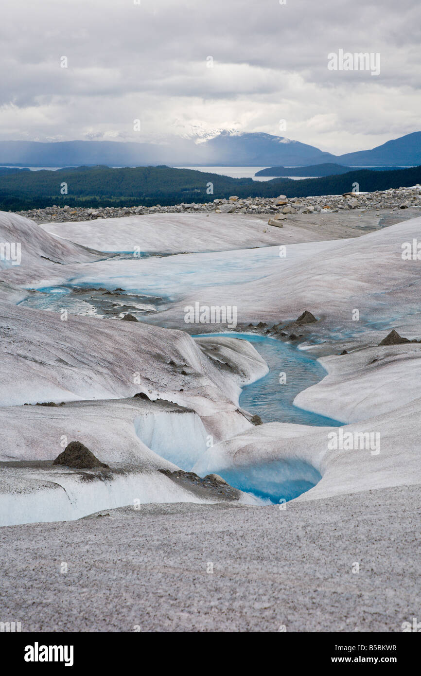 Melting ice carves streams into top of Mendenhall Glacier near Juneau ...