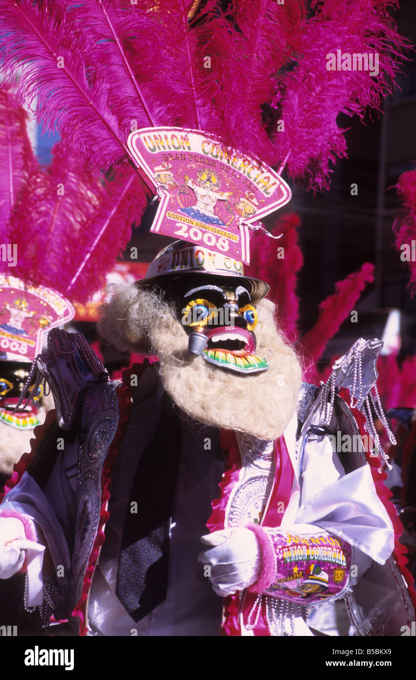 Portrait of a rey moreno morenada dancer wearing a mask and pink ...
