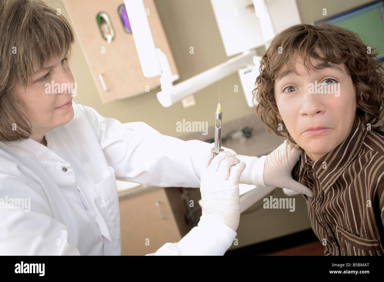 Boy about to get needle Stock Photo - Alamy