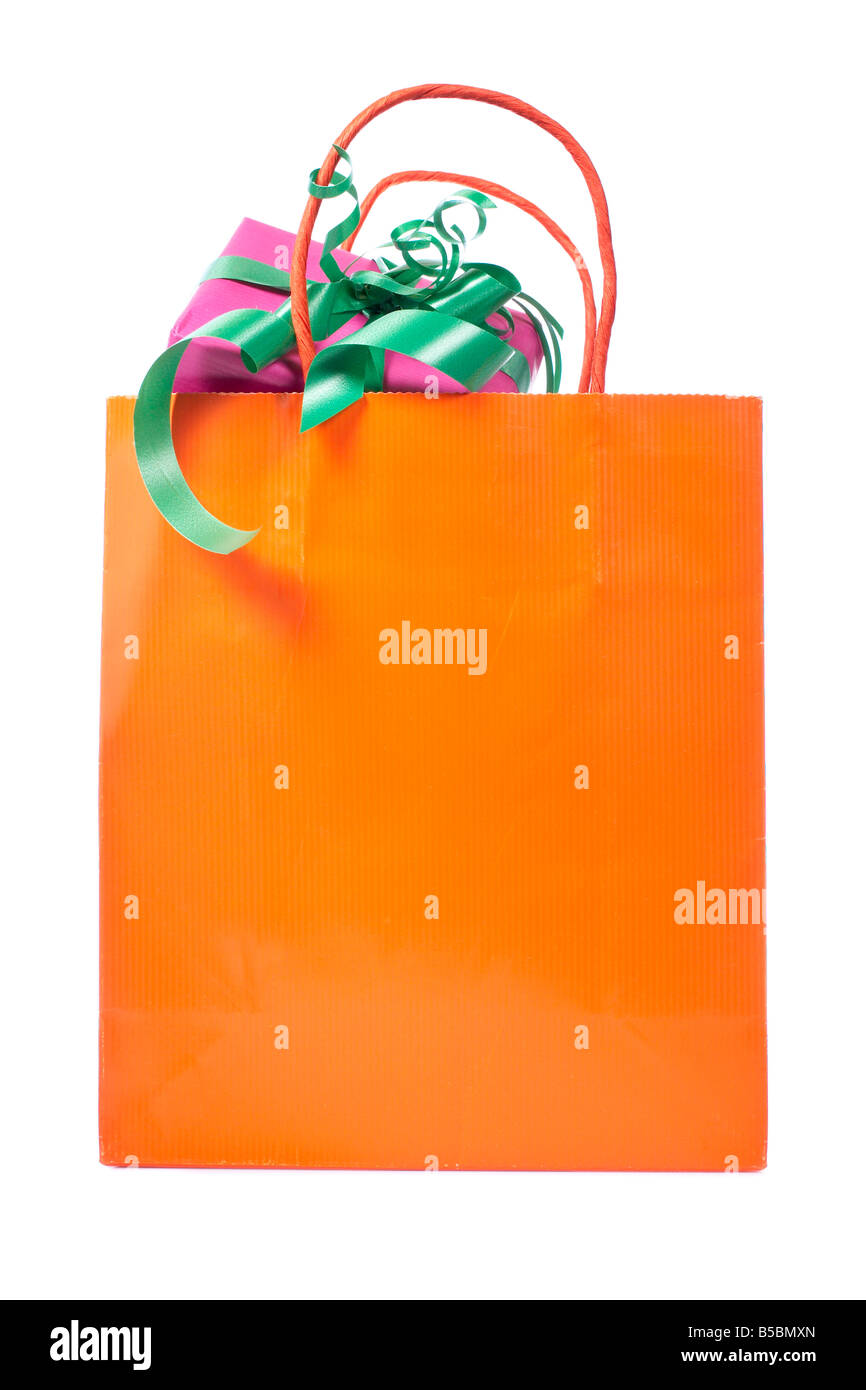 Shopping bag with gifts inside isolated on white background Stock Photo ...