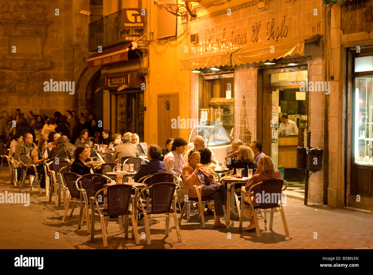 People sitting outside Horchateria El Siglo tiger nut milk cafe on ...