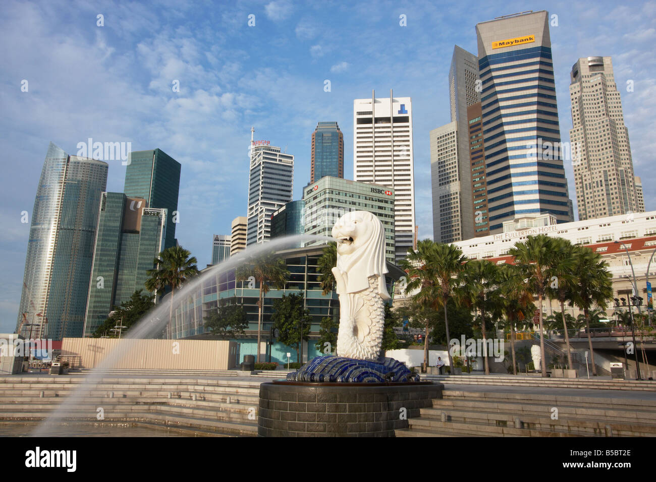 Merlion Statue In Front Of Skyscrapers In Central Business District ...