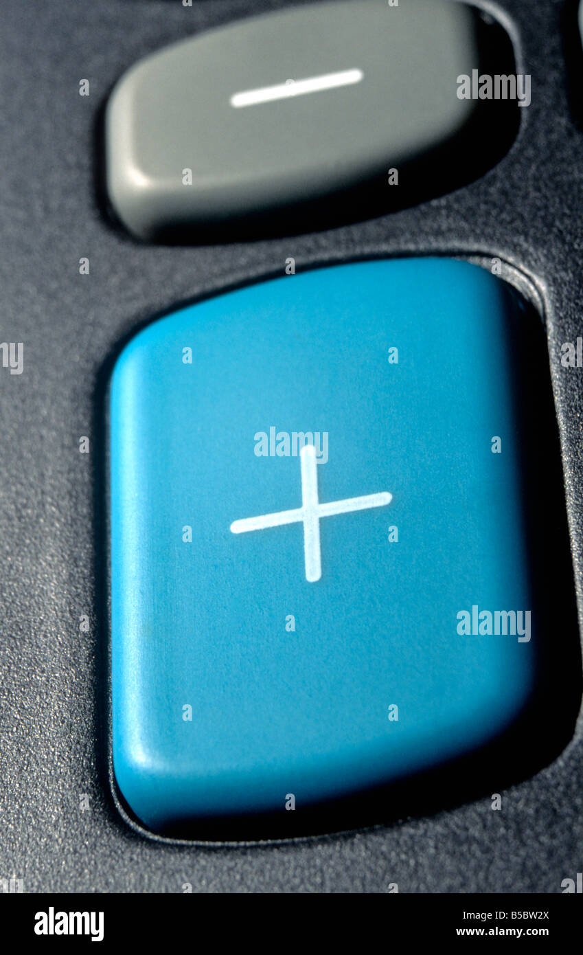 Close up of addition and subtraction sign on calculator Stock Photo - Alamy