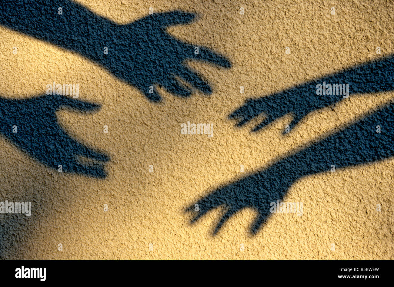 Helping hands, adult stretching out to the hands of a child Stock Photo ...