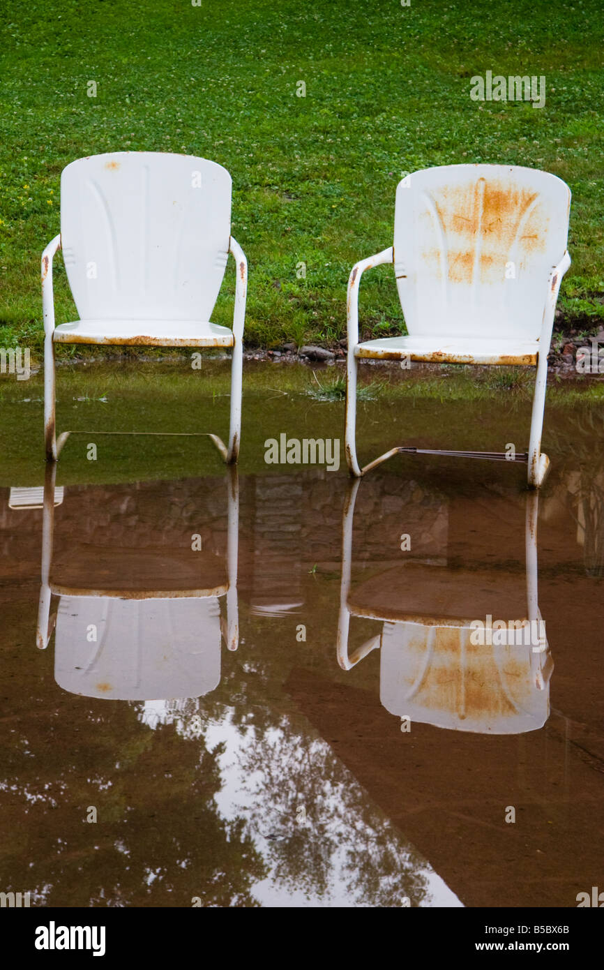 Chair in puddle hi-res stock photography and images - Alamy