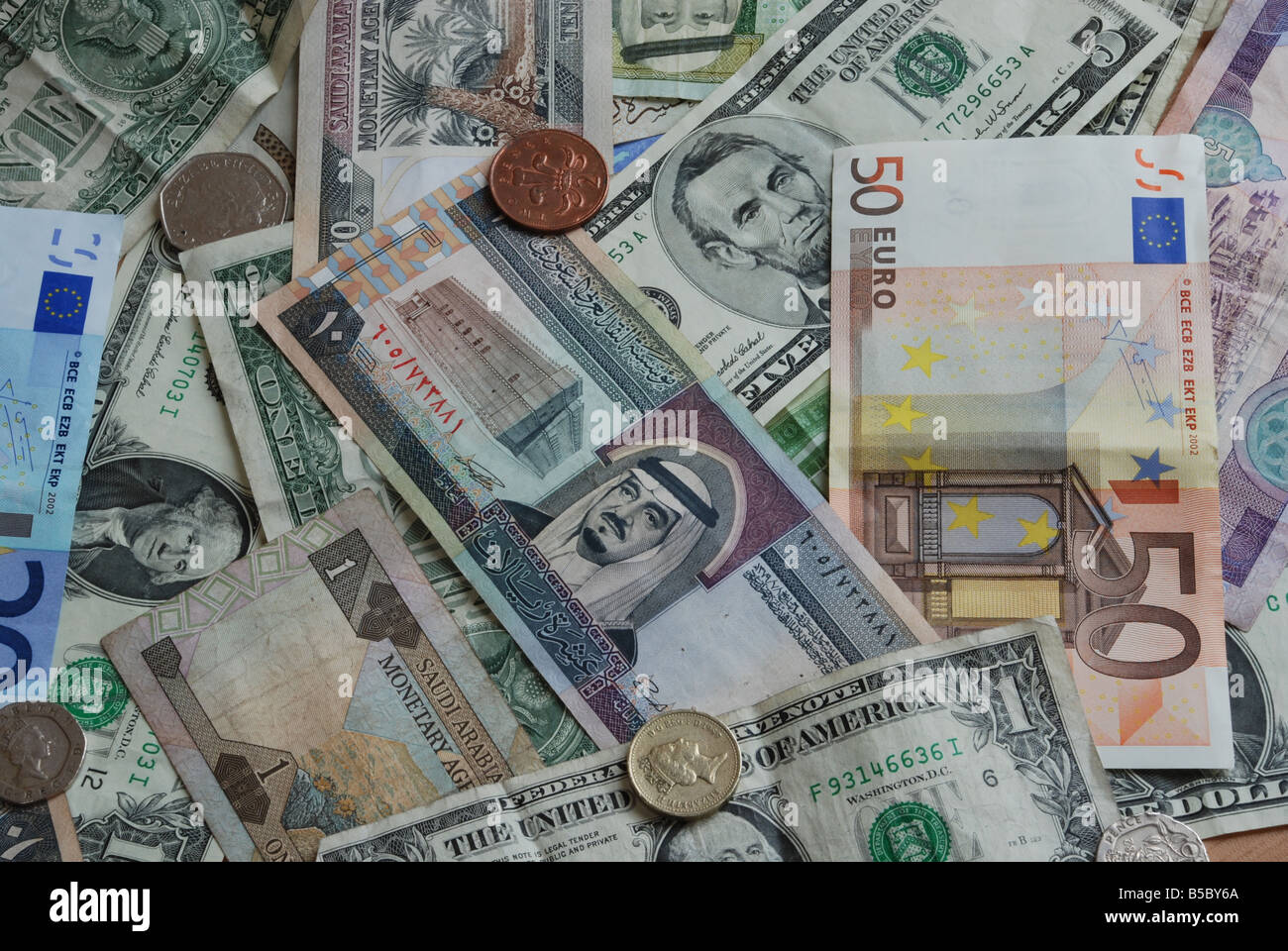 Eastern and Western currencies Stock Photo - Alamy