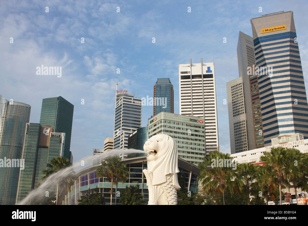 Merlion Statue In Front Of Skyscrapers In Central Business District ...