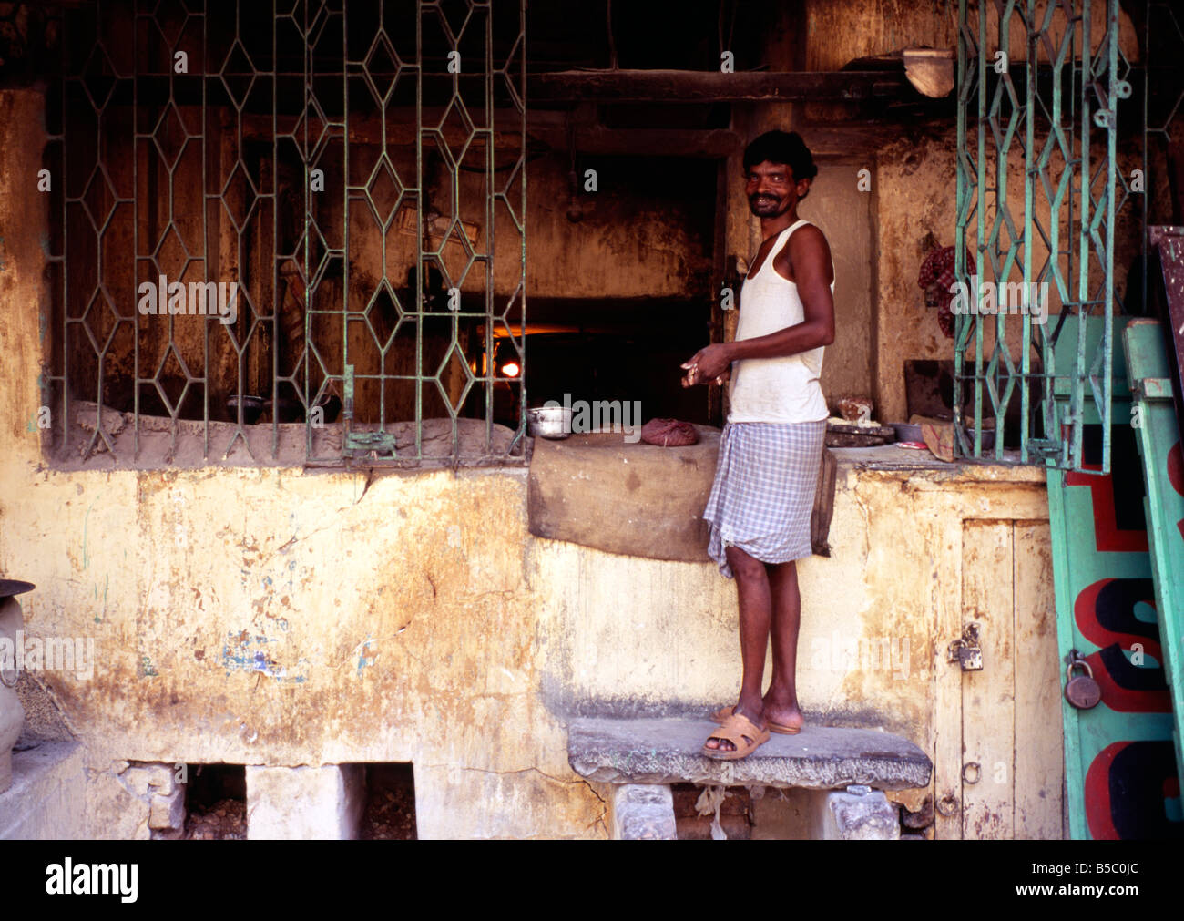 man outside house, Delhi, India Stock Photo - Alamy