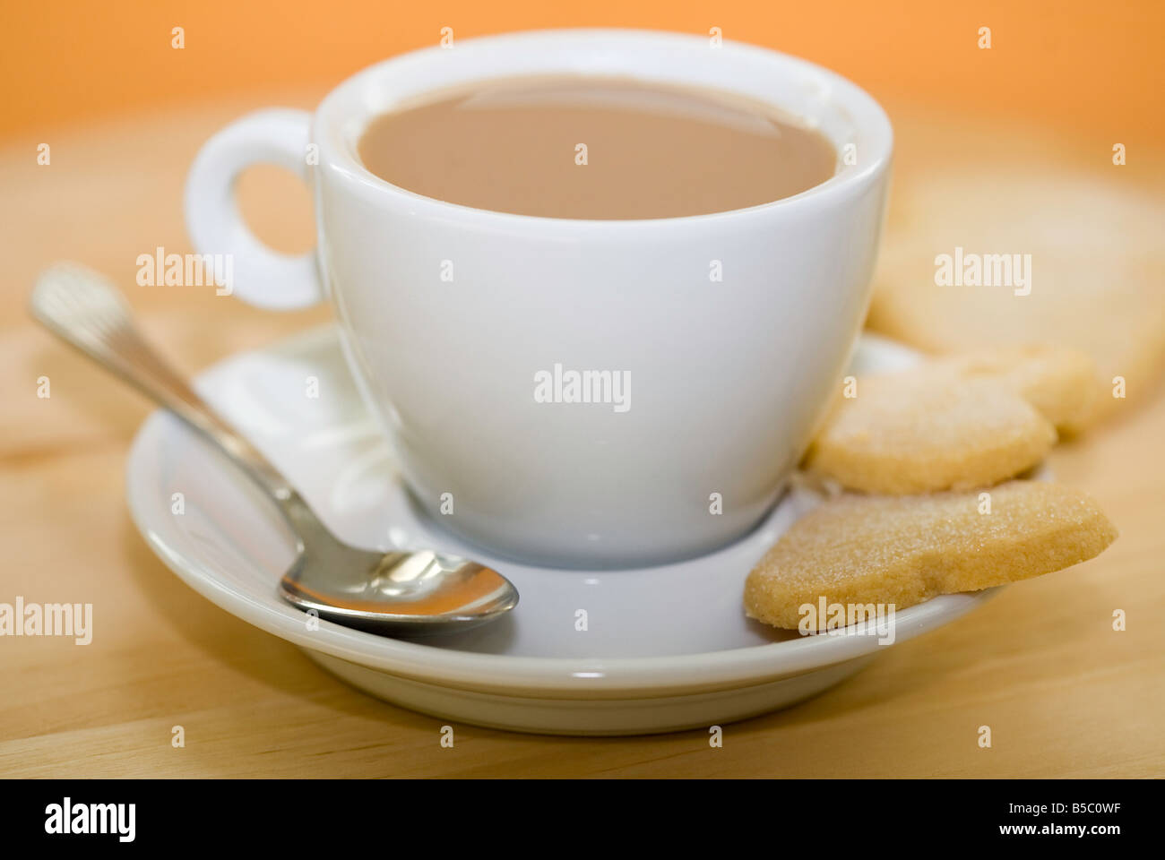 Cup of coffee and heart shaped shortbread biscuits Stock Photo - Alamy