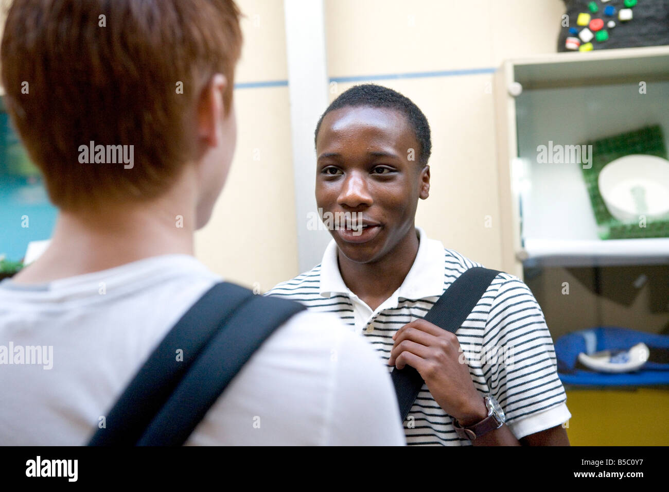 School Hallway With Students Talking