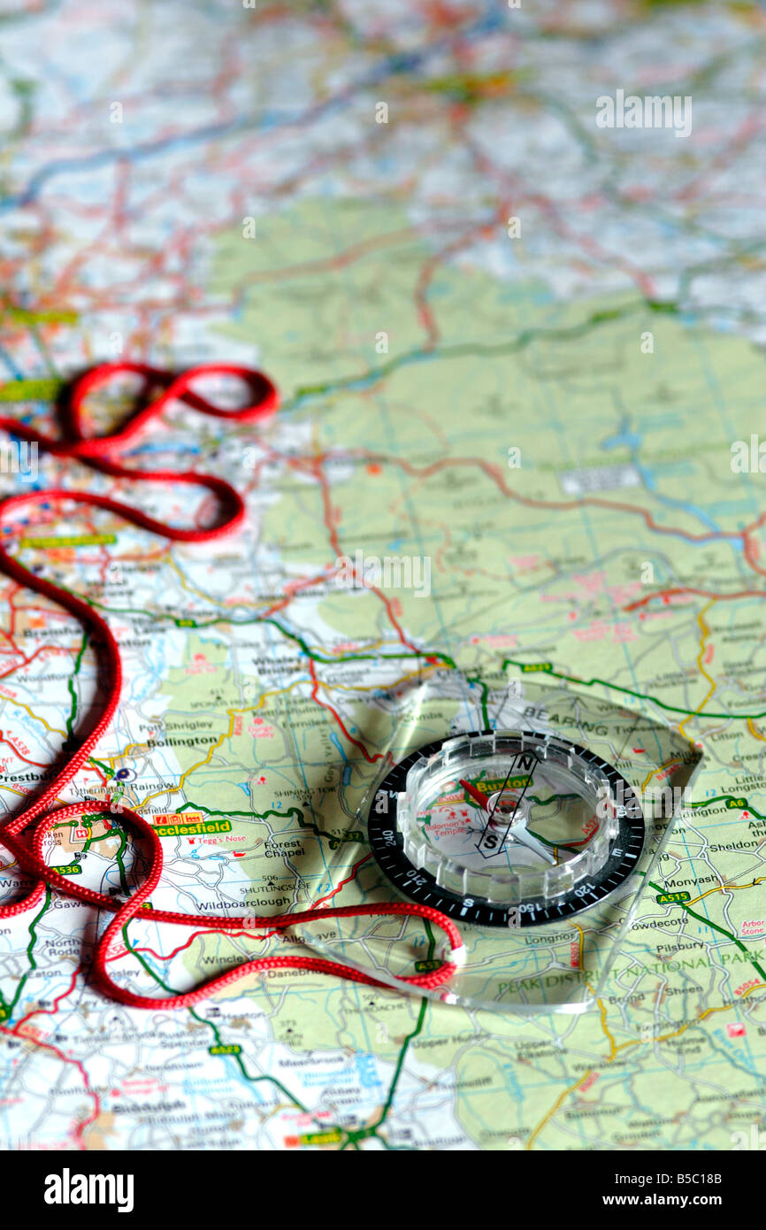 Compass on road map close up Stock Photo - Alamy