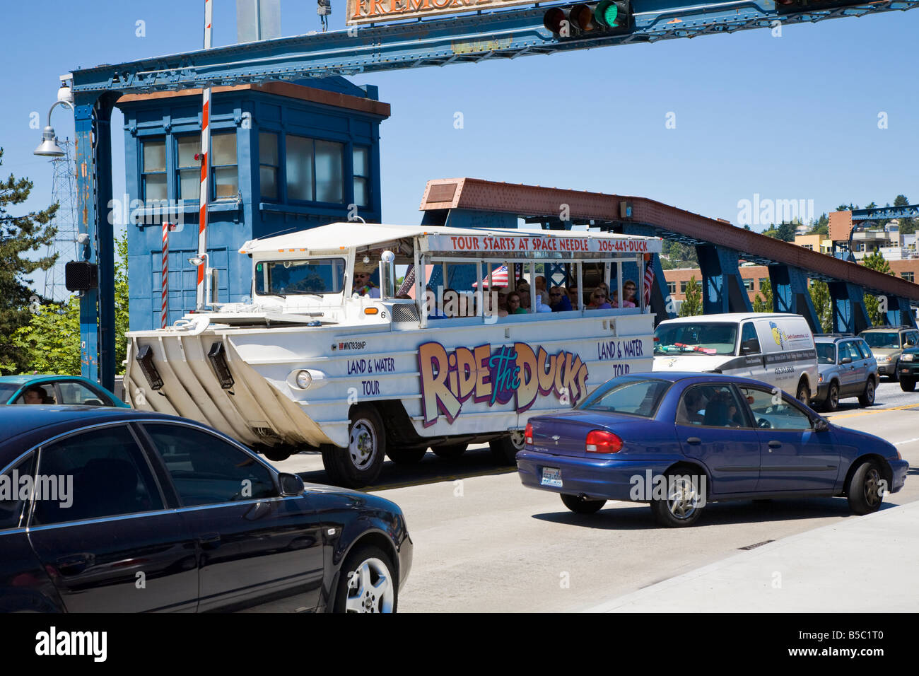Ride the Ducks tour bus and boat crossing Fremont bridge in Seattle ...