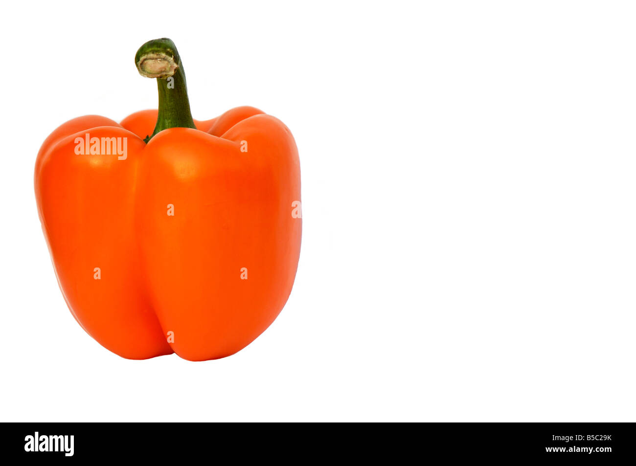 Orange sweet pepper on white background Stock Photo - Alamy