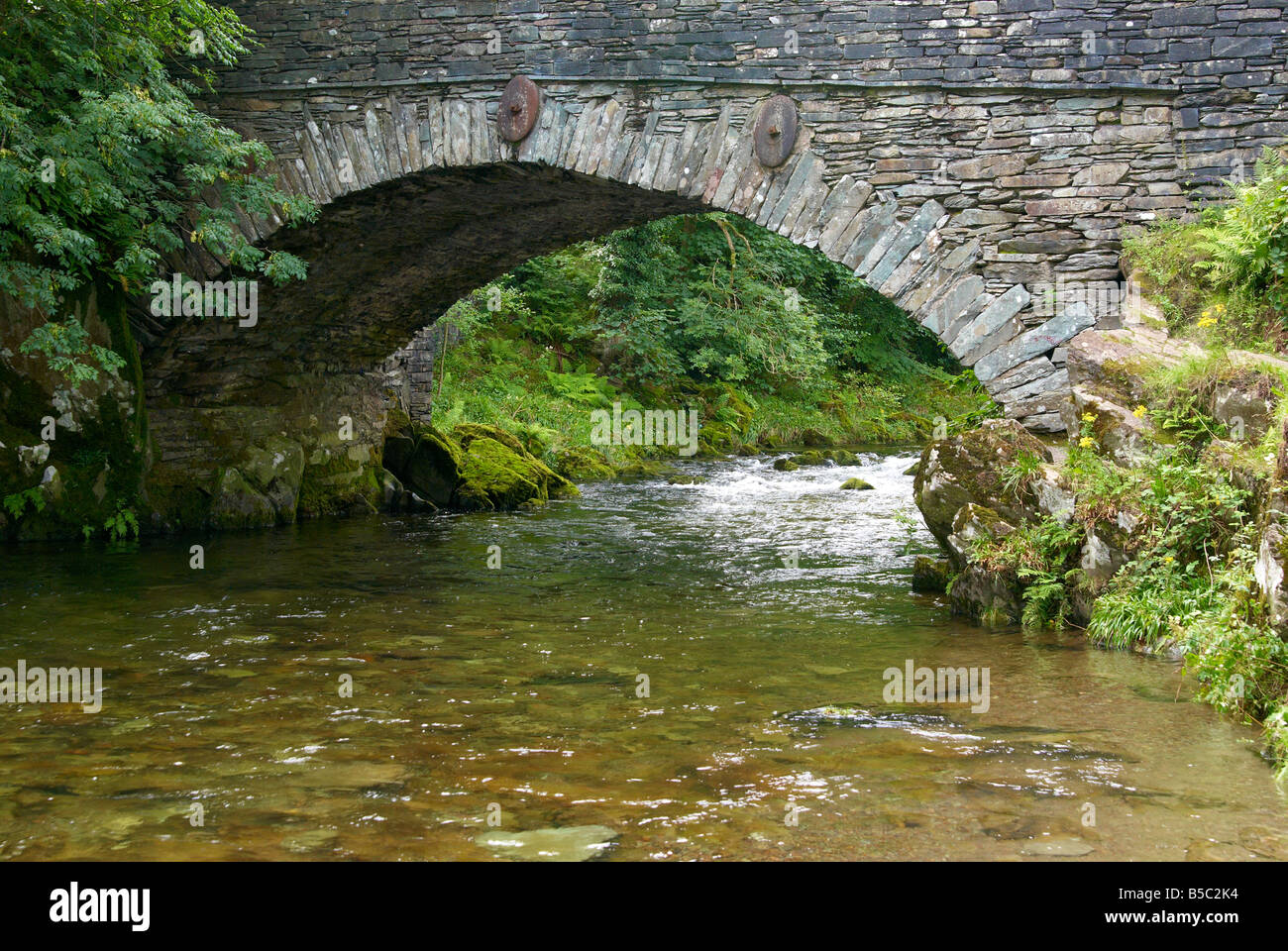 Stone bridge at Elterwater, English Lake District, Cumbria Stock Photo ...