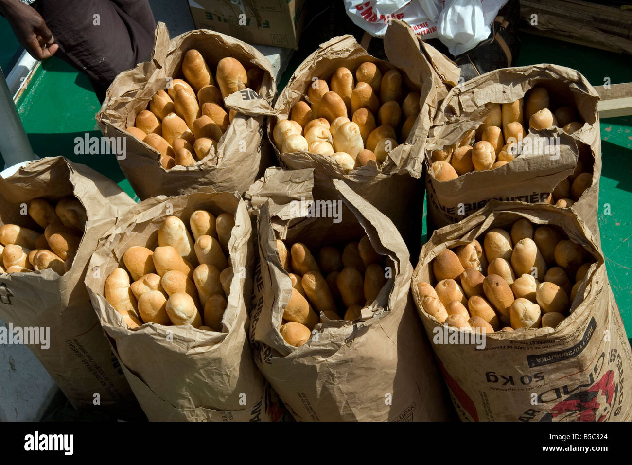 Sacks full of French bread Dakar Senegal Stock Photo - Alamy