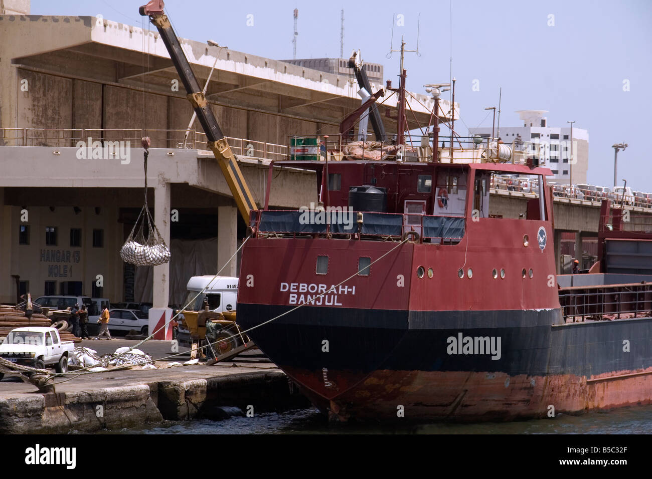 Port scene Dakar Senegal with Gambian cargo vessel loading for local ...