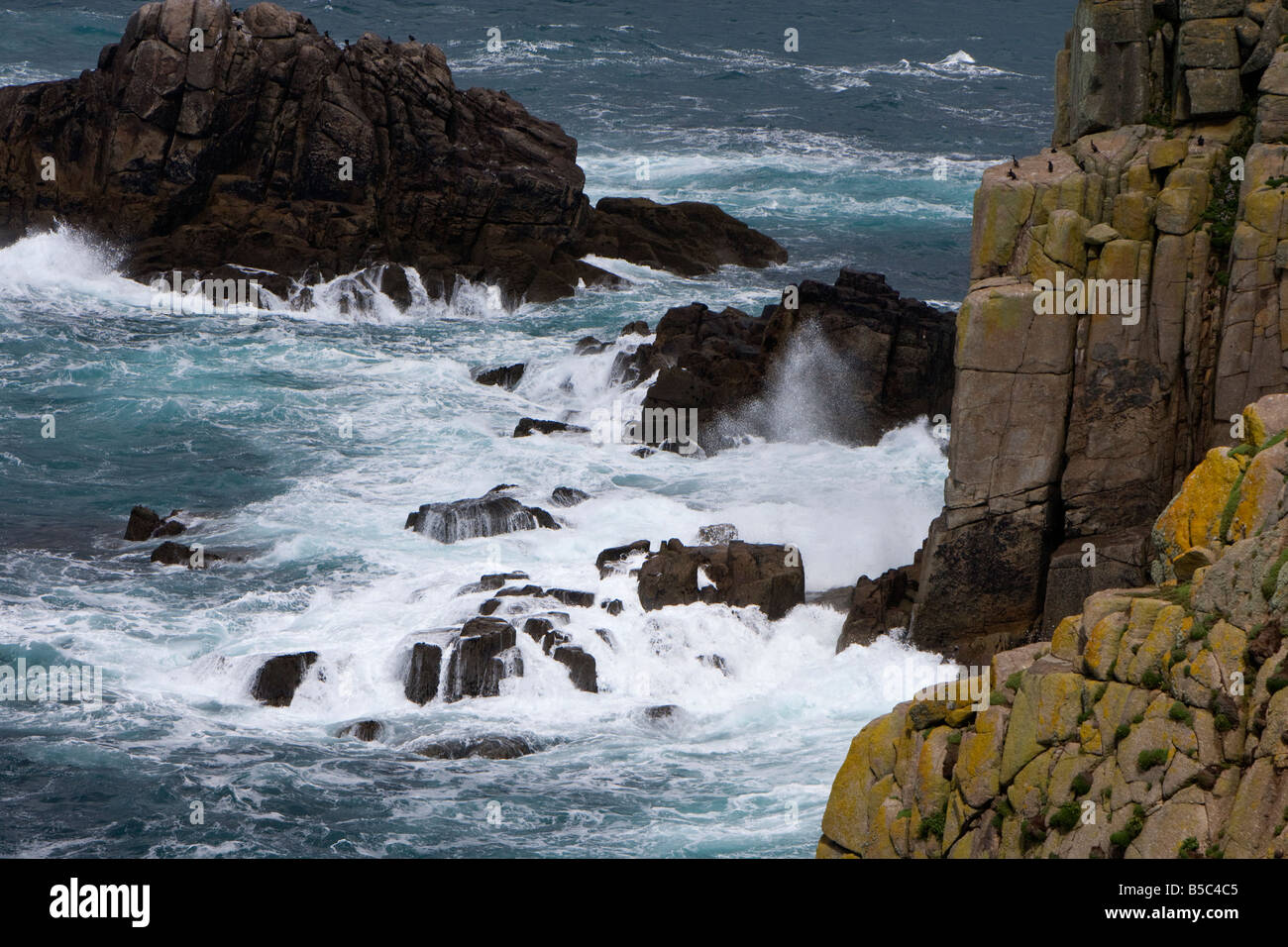 stormy seas and steep cliffs Stock Photo - Alamy