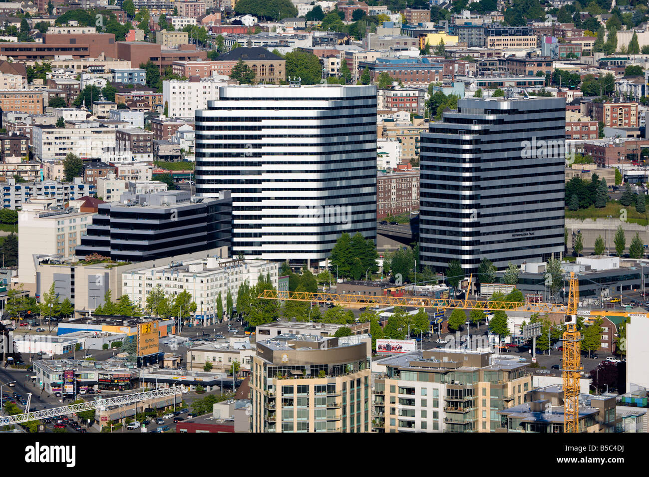 Tower crane hovers over buildings in downtown Seattle, Washington, USA ...