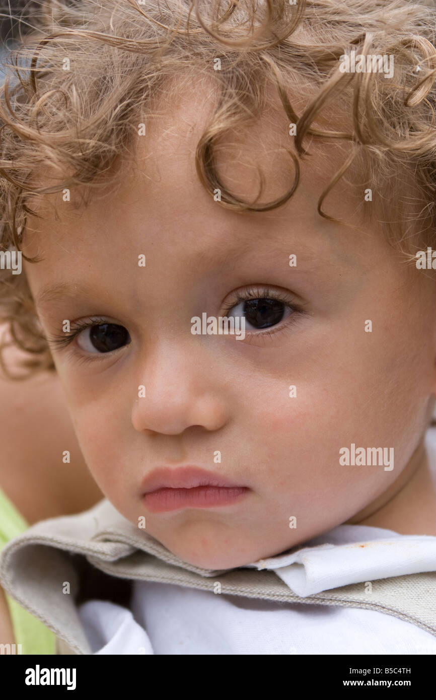 Sad face on a little boy Stock Photo - Alamy