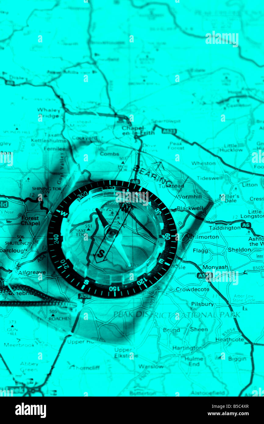 Compass on road map close up Stock Photo - Alamy
