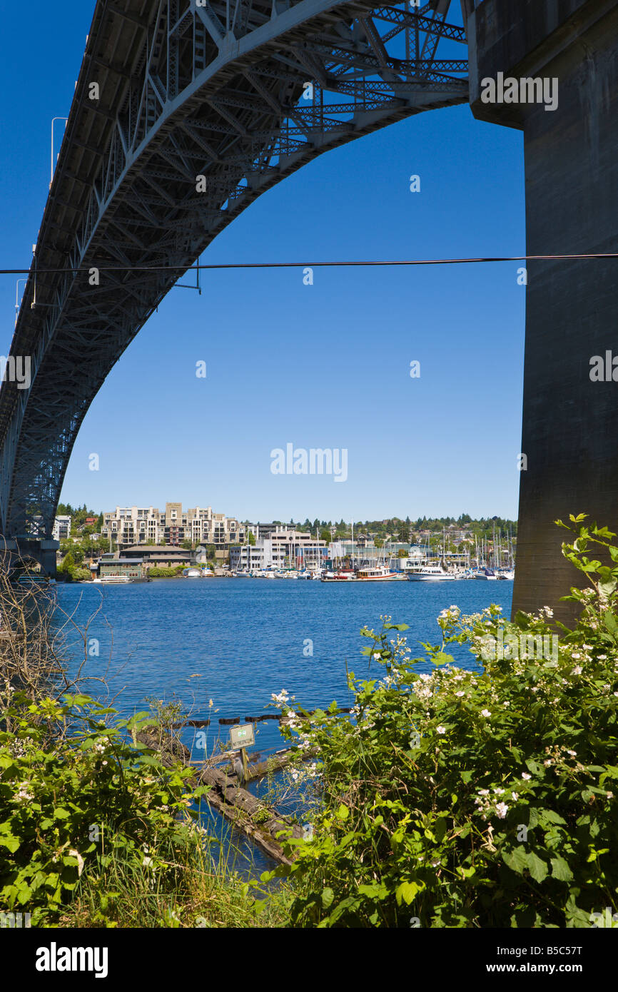 Aurora Bridge towers over a marina on Lake Union in Seattle, Washington ...