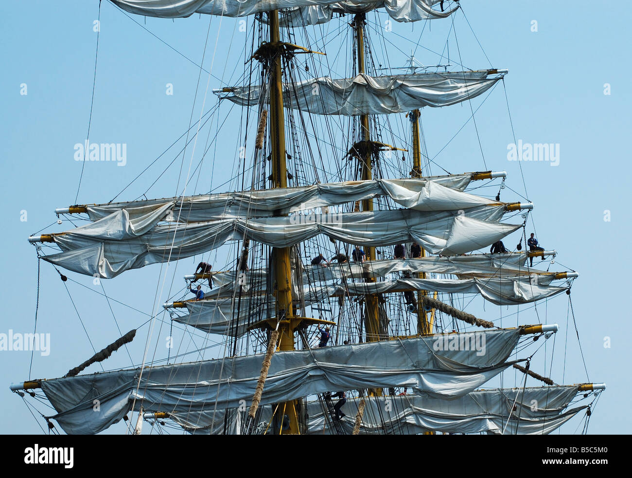 Furling Sails on a Tall Ship Stock Photo, Royalty Free Image: 20551552 ...