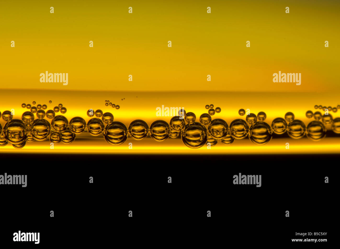 Bubbles Floating in Liquid Stock Photo - Alamy