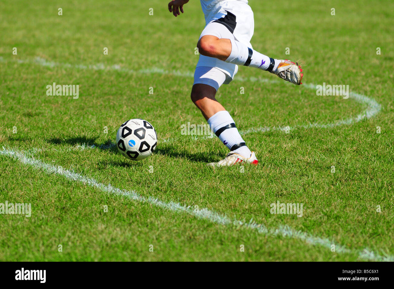 youth soccer players playing football Stock Photo - Alamy