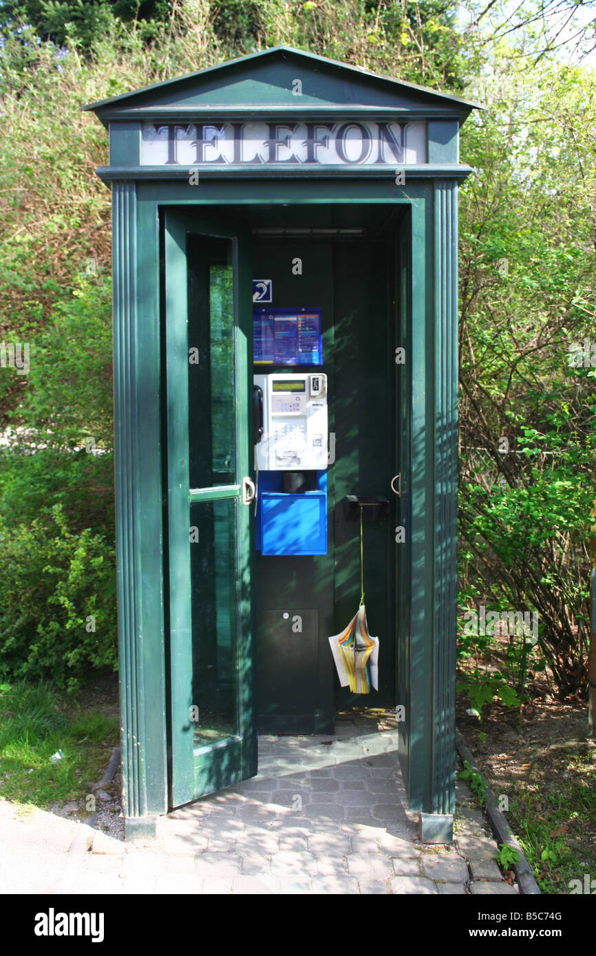 Telephone box with address book Stock Photo - Alamy