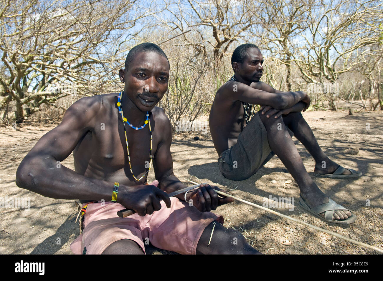 A members of the Hadza tribe prepare to go hunting Lake Eyasi Tanzania ...