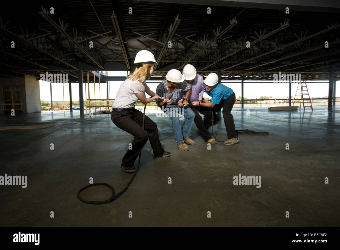 Workers fighting on the job site Stock Photo - Alamy