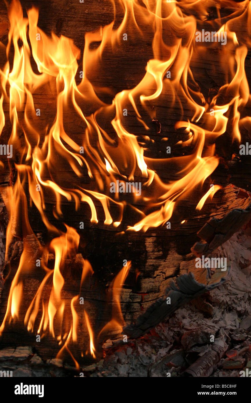Flames rising from a bonfire Stock Photo - Alamy