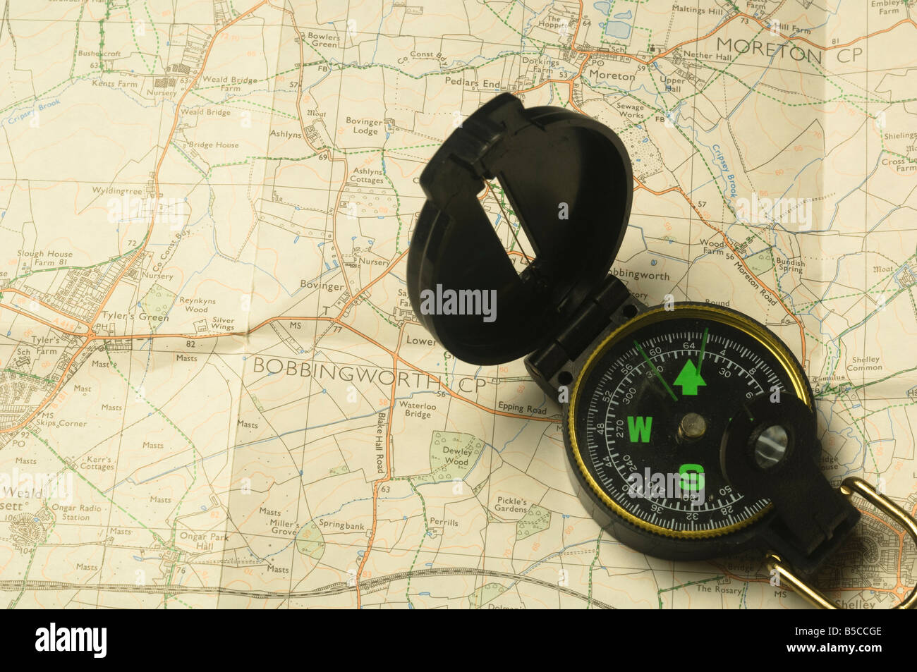 Map and compass Stock Photo - Alamy