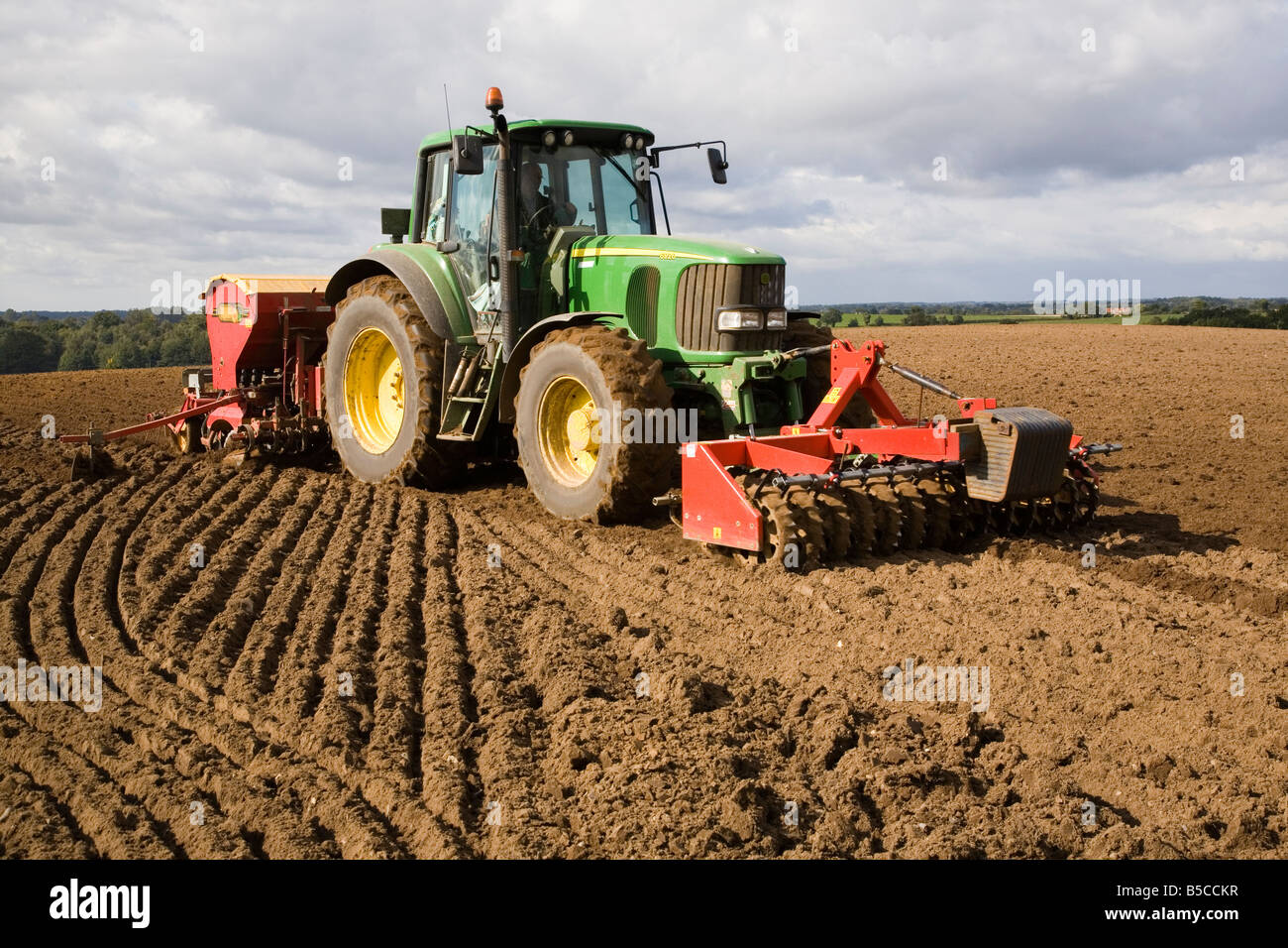 Tractor with seed drill hi-res stock photography and images - Alamy