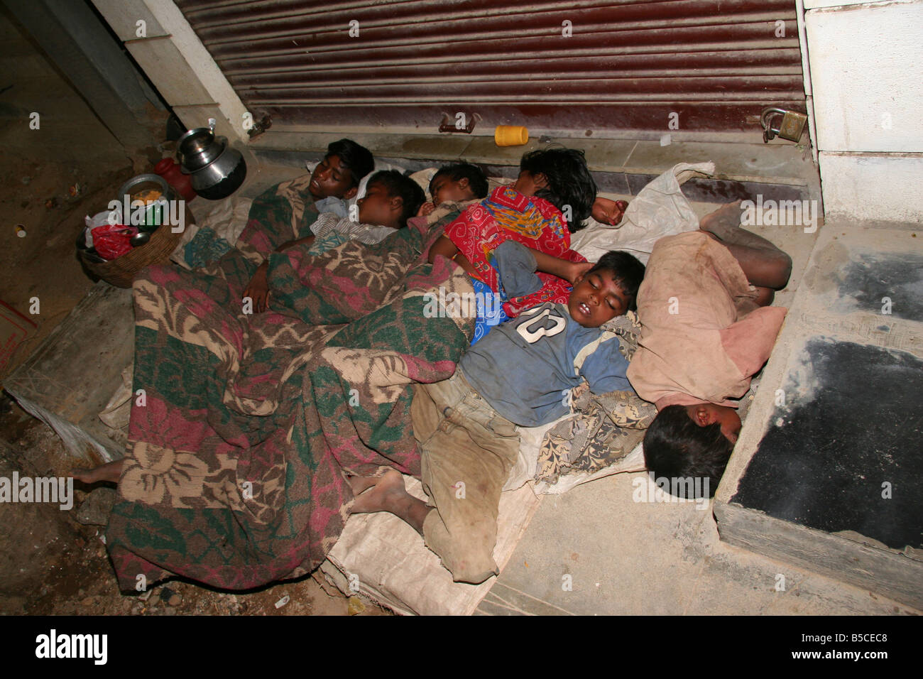 Homeless street boys sleeping in hi-res stock photography and images ...