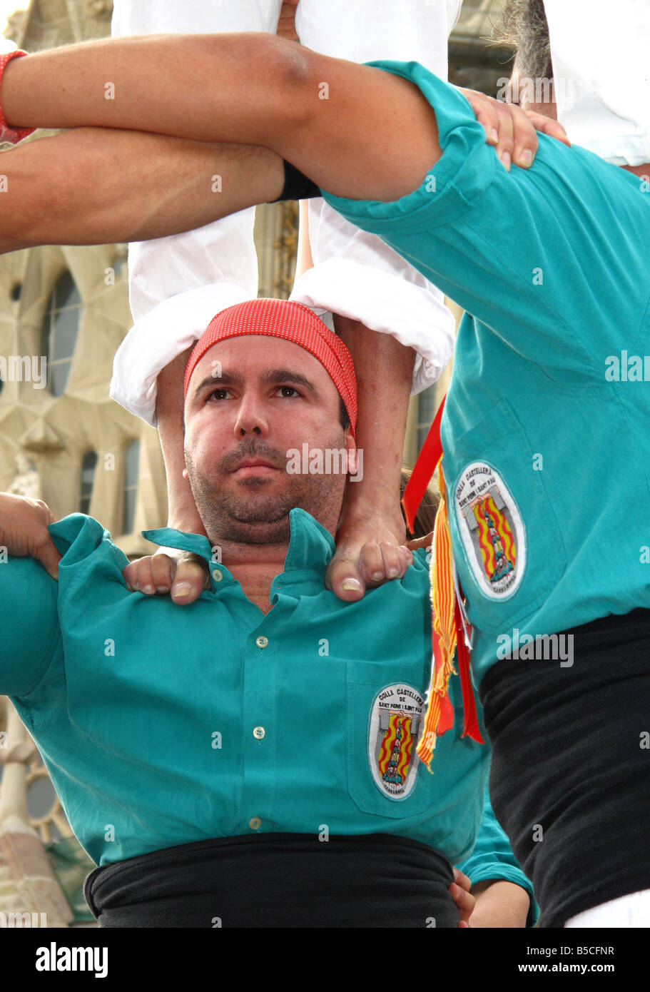 Close-up of Castellers building a human tower(castell)in festival ...