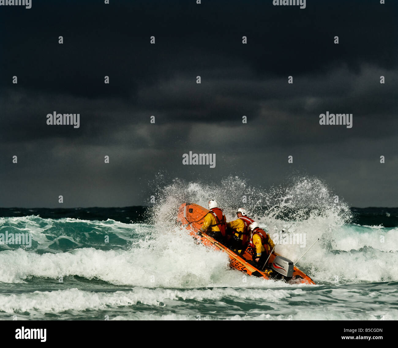 THE RNLI Inshore craft exercising under a dramatic sky at Sennen in ...