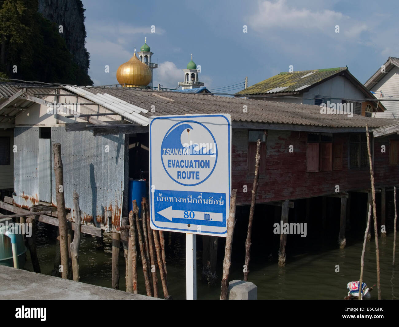 tsunami evacuation sign on Koh Panyi island in Phang Nga Thailand Stock ...