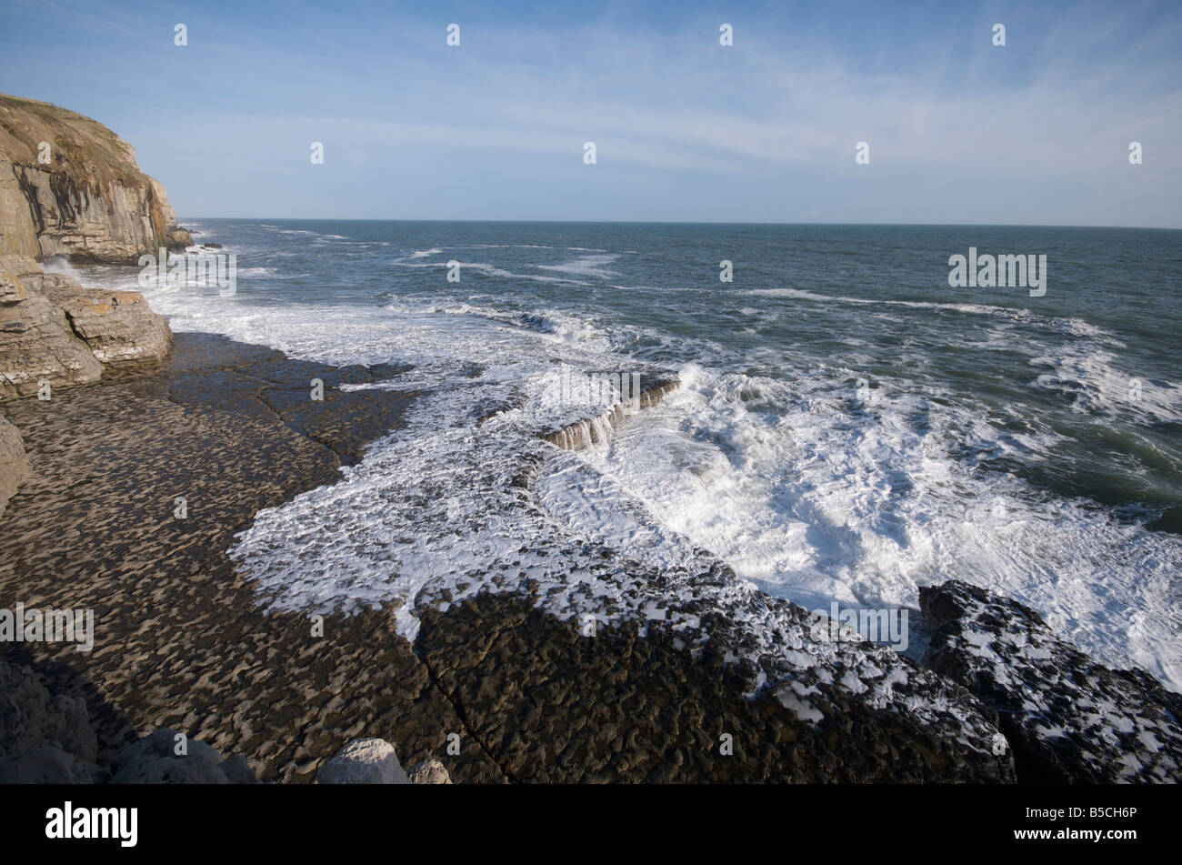 Waves break over Dancing Ledge, Dorset Stock Photo - Alamy