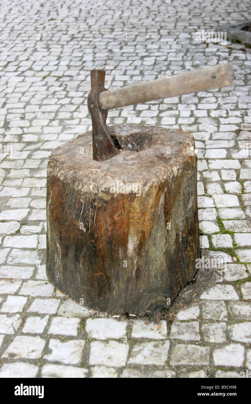old axe on a tree stump Stock Photo - Alamy