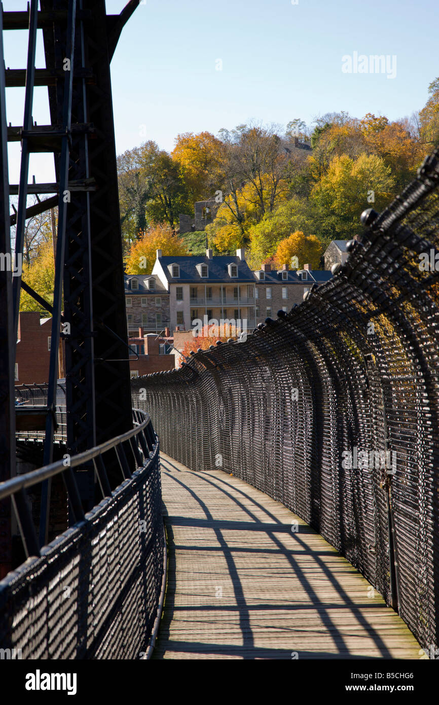 A walkway carries pedestrians across the Potomac River on the railroad ...