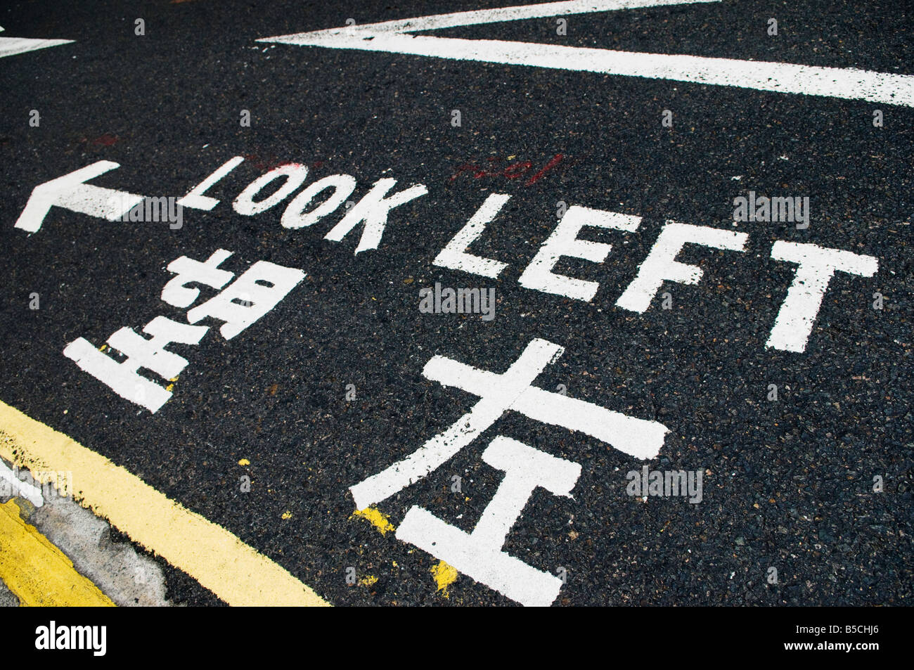 "Chinese and English traffic sign on a road in Hong Kong Stock Photo ...