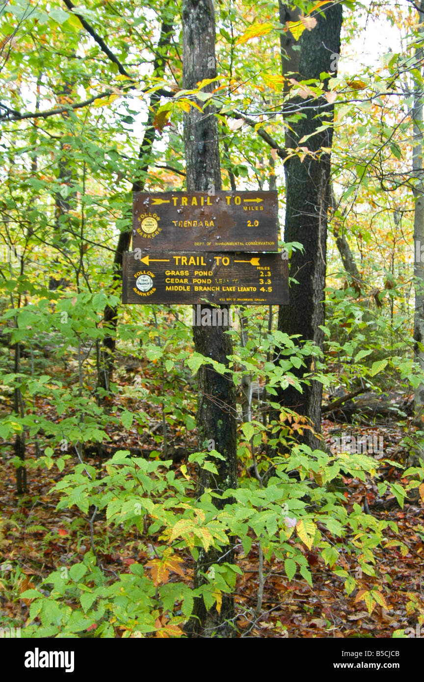 Trail marker in the park Stock Photo - Alamy